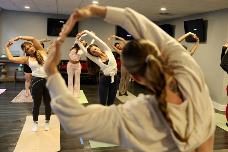 I took the first-of-its-kind 'Pistols and Pilates' class — and it left ...