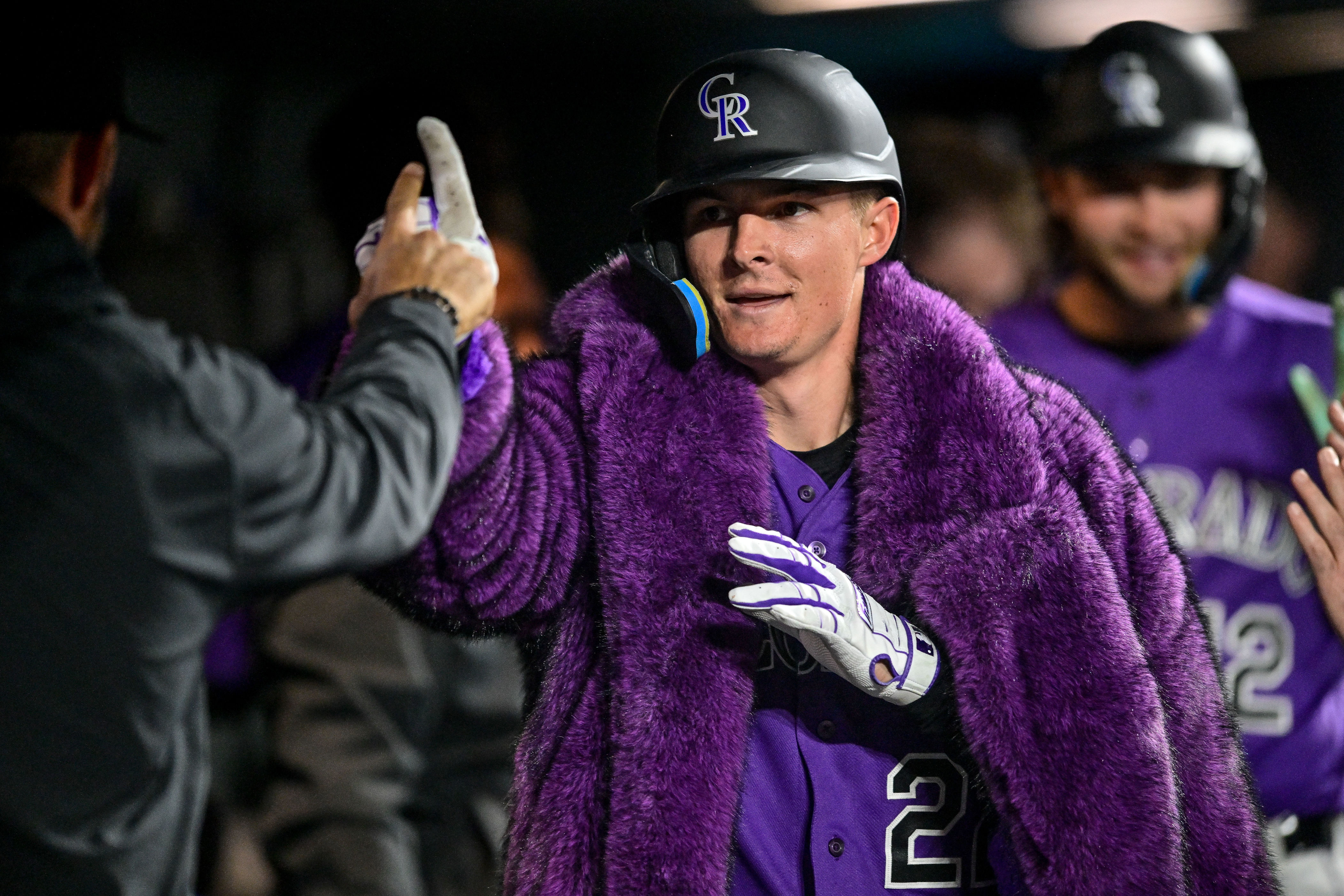 The Rockies and the amazing purple-colored home run coat
