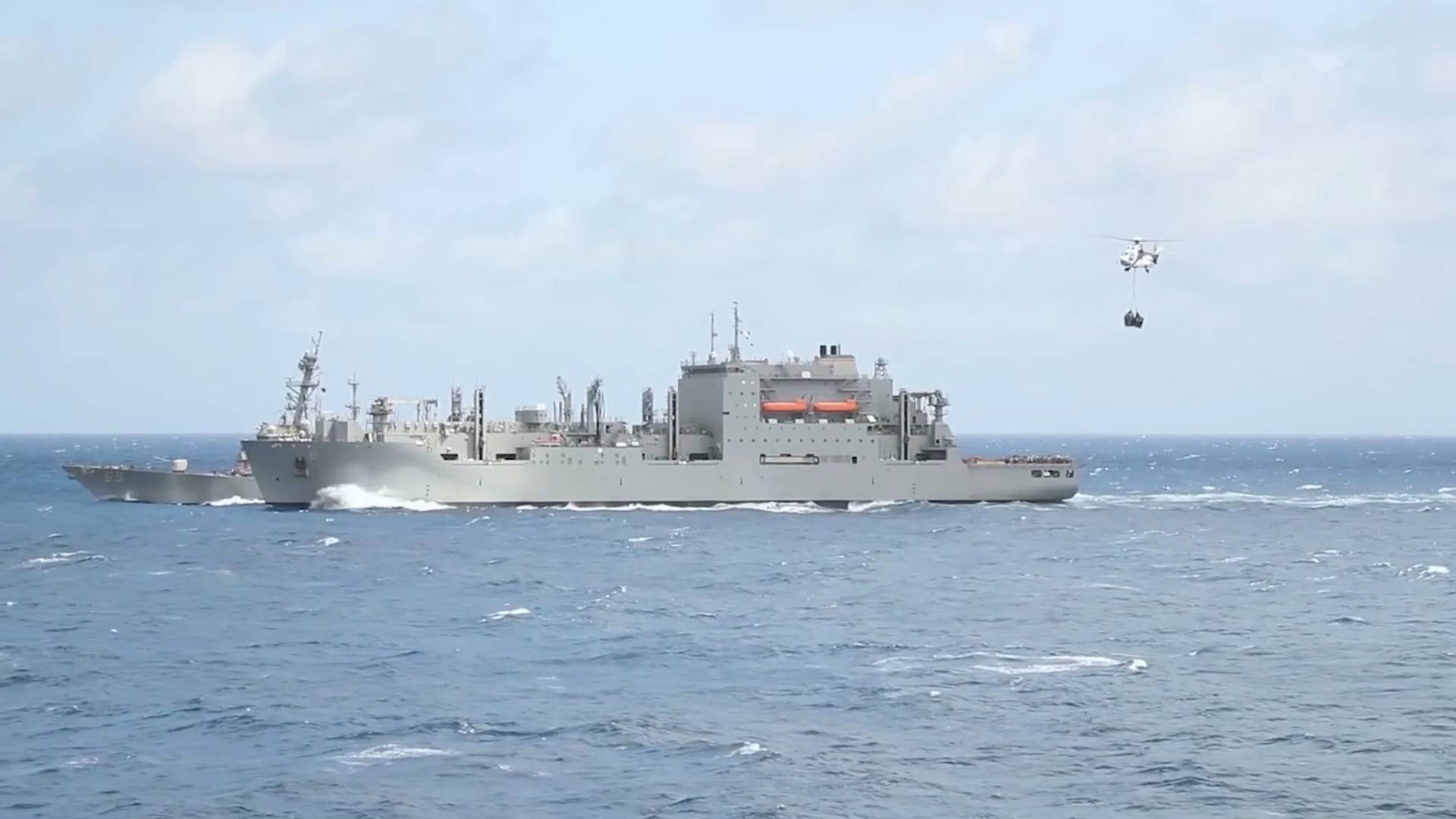 US Navy replenishment operation in the Middle East with USS Tripoli