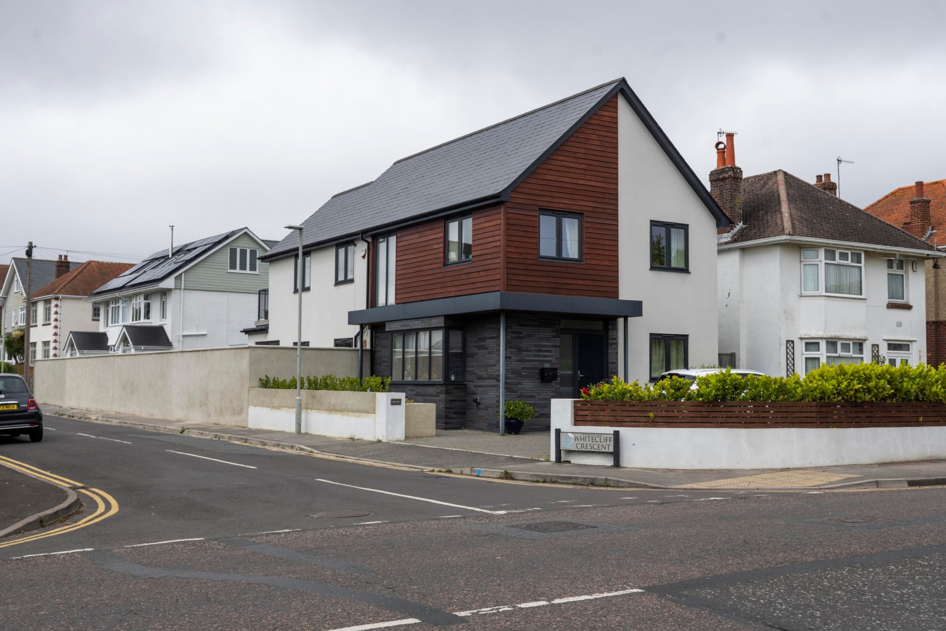Dorset homeowner builds 7ft concrete 'Berlin Wall' outside £1,000,000 ...