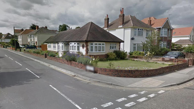 Dorset homeowner builds 7ft concrete 'Berlin Wall' outside £1,000,000 ...