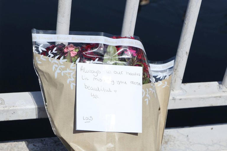 Mourners leave flowers and tributes at beauty spot after death of ...