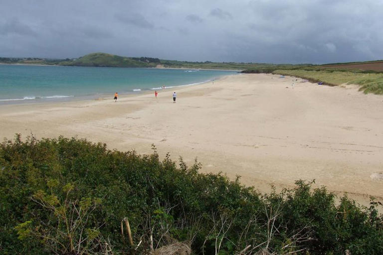 Cornwall beach tragedy as man dies trying to save family members in water