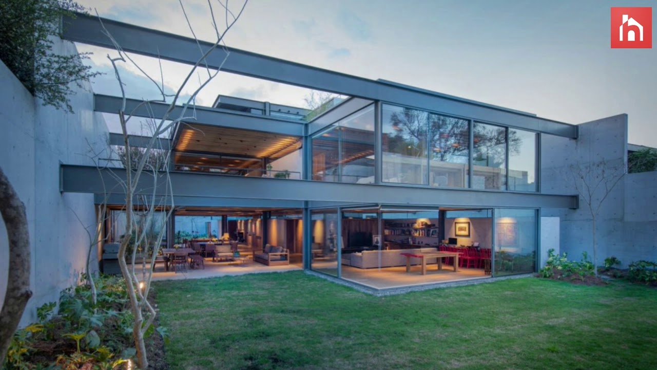 Family house features an exposed metal structure which doubles as its ...