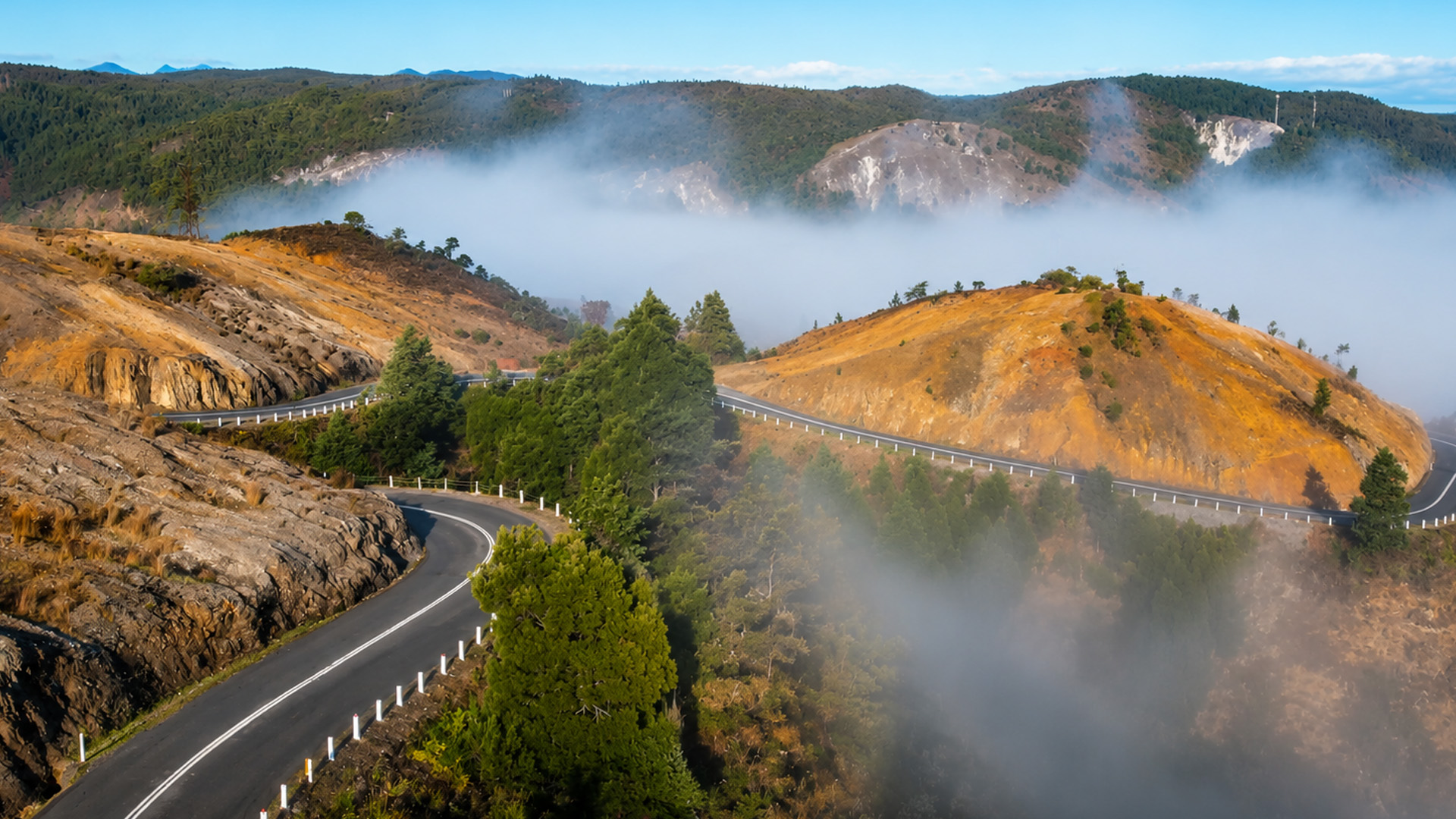 A winding route through burned volcanic terrain