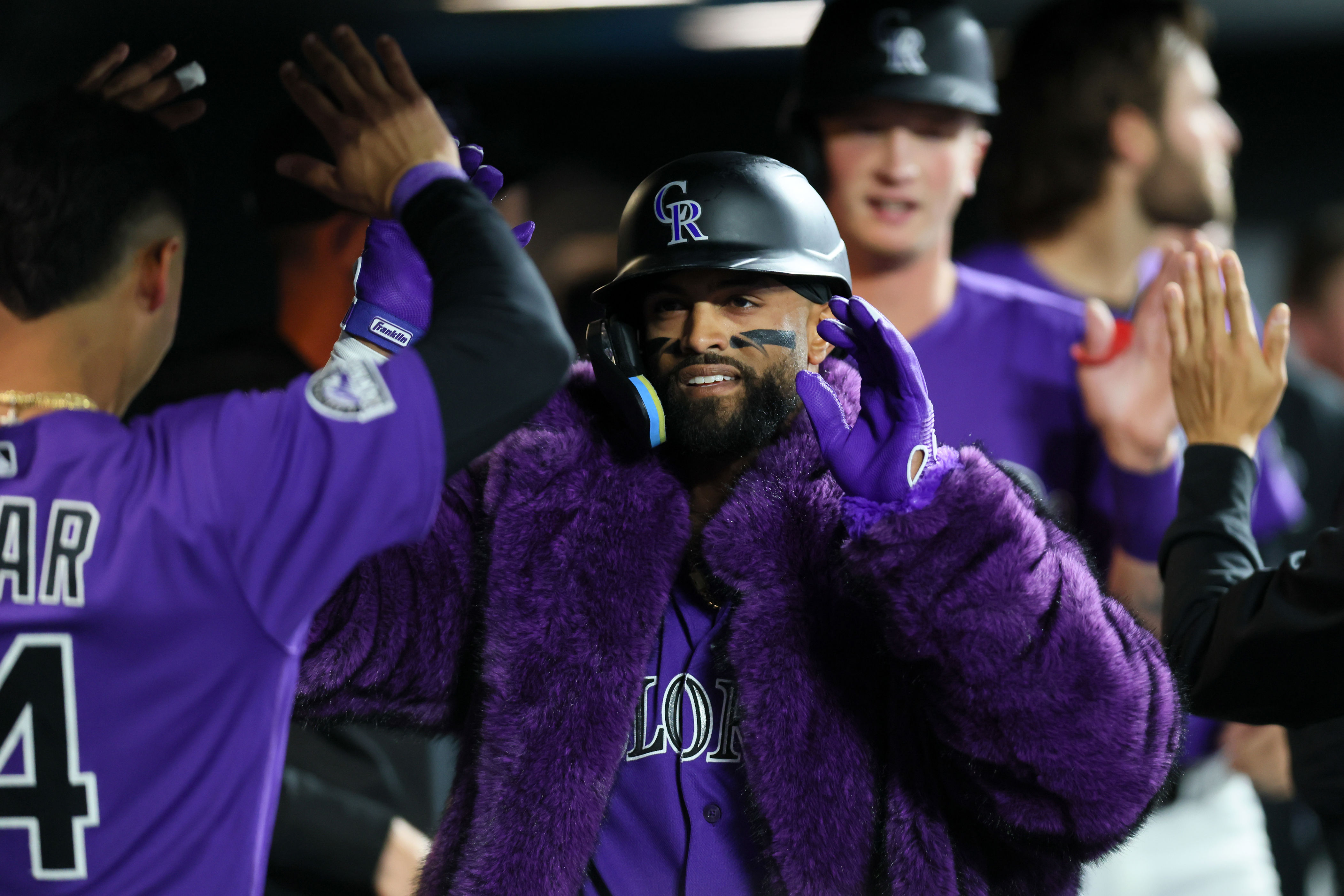 The Rockies and the amazing purple-colored home run coat
