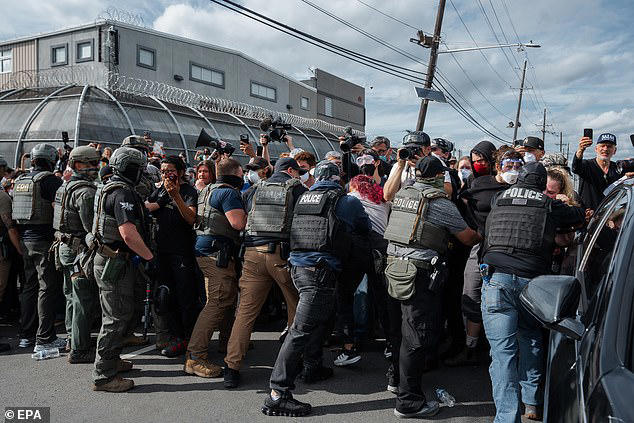 Senator pepper-sprayed as protesters storm ICE detention center