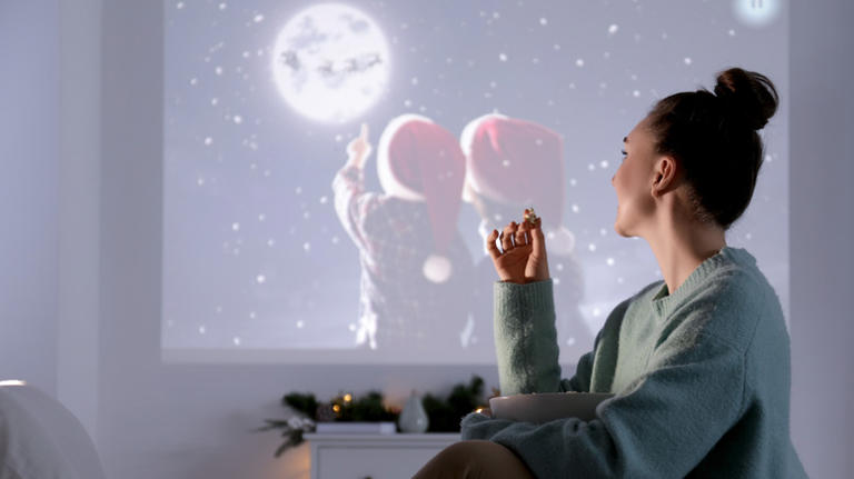 Turn your bedroom into an occasional cozy movie spot without getting ...