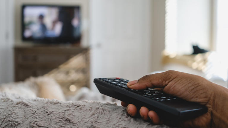 Turn your bedroom into an occasional cozy movie spot without getting ...