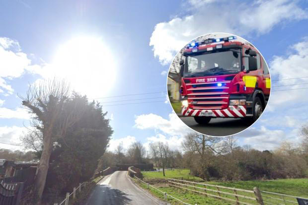 Village road closed as fire crews attend incident