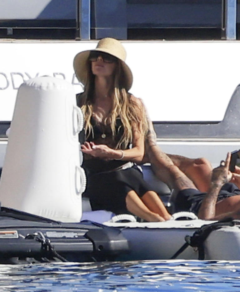 Bikini-clad Victoria Beckham and shirtless David celebrate holiday on ...