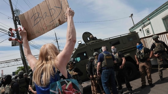 ICE agents clash with protesters outside Newark detention center amid ...