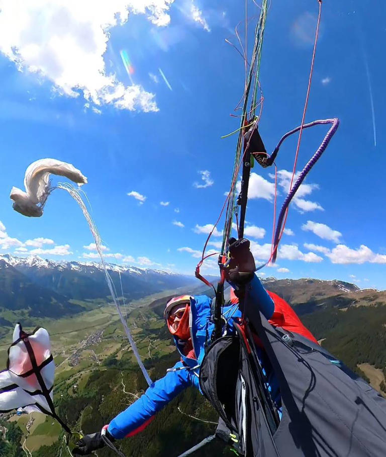 Horrifying moment paraglider collides with plane over Alps