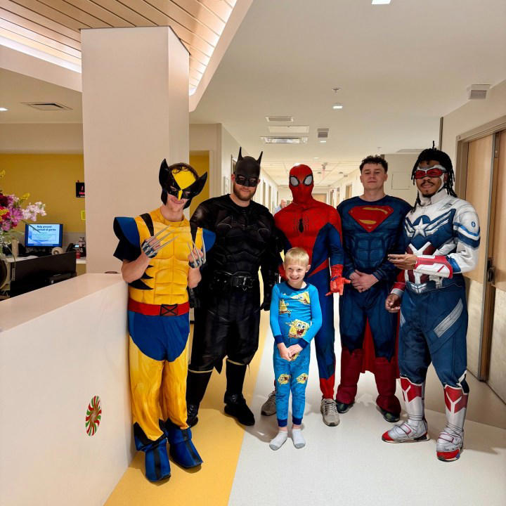 Superhero window washers surprise patients and their families at WVU ...