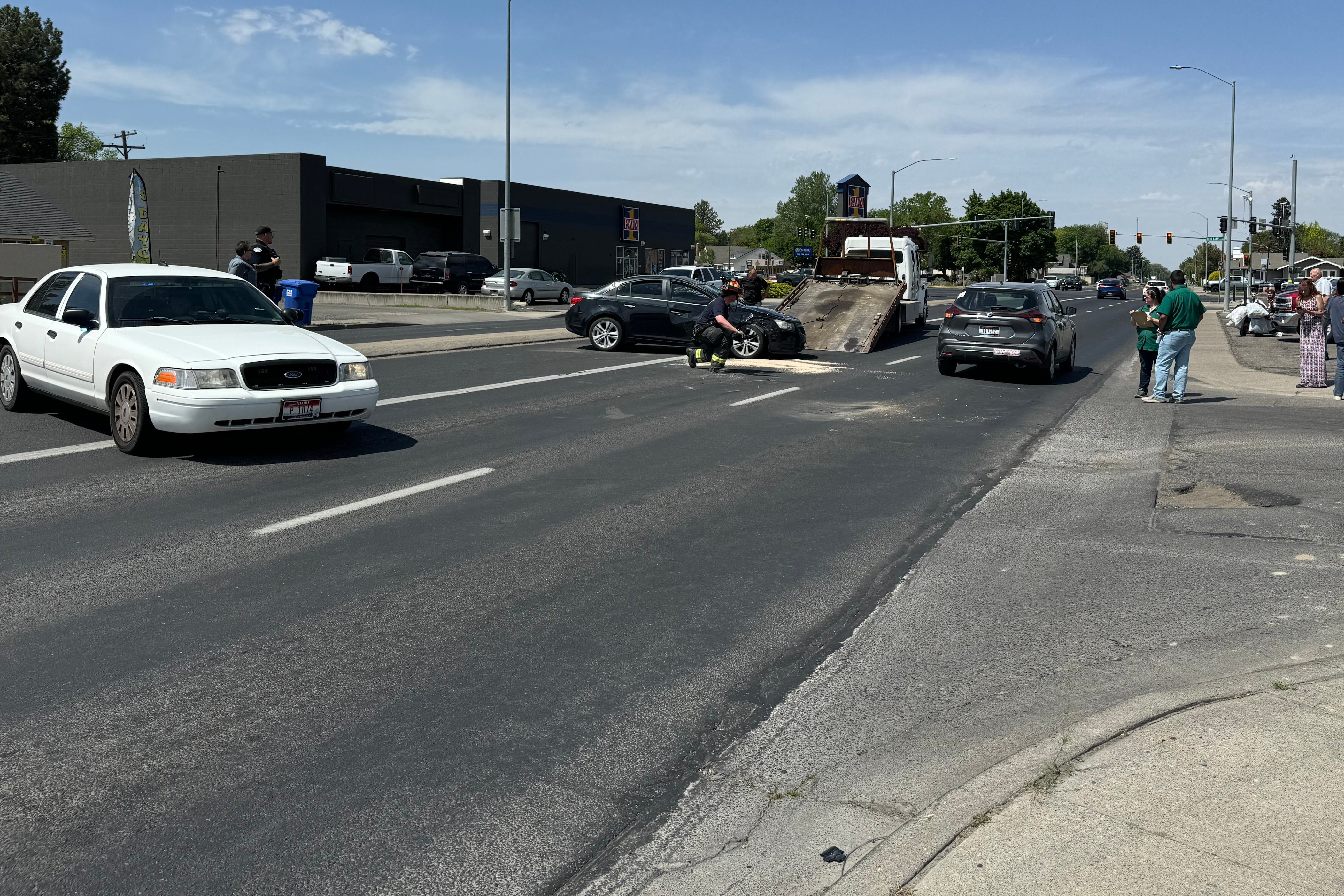 Car flips over in front of Albertsons