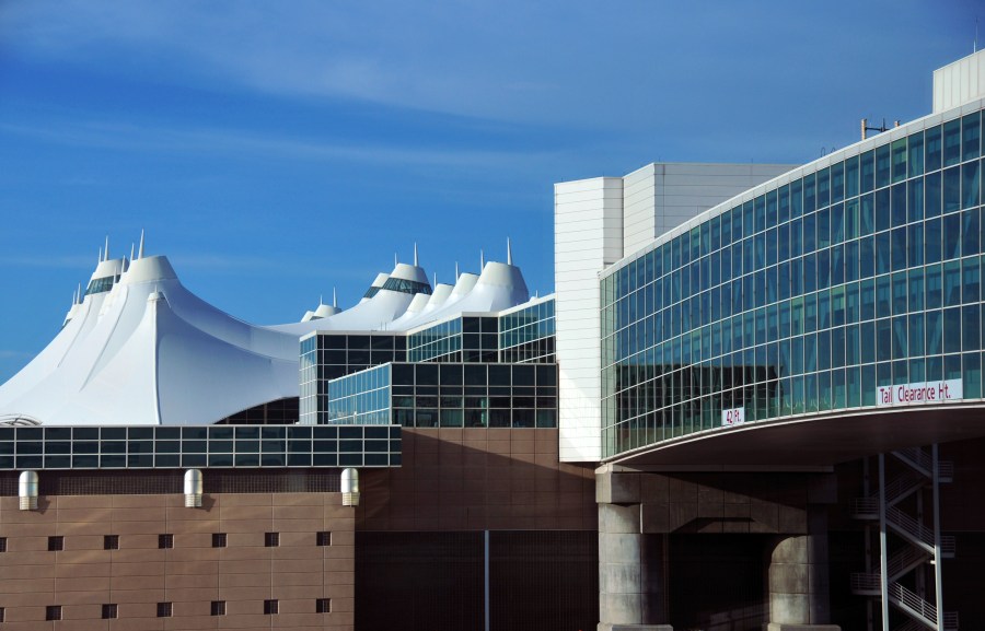 Vehicle crashes through security gate at DIA, suspect arrested