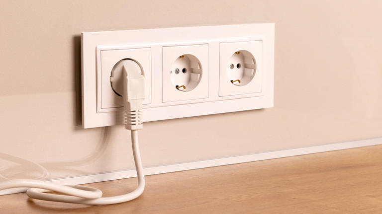 What are the different holes in electrical outlets for (and why they're ...