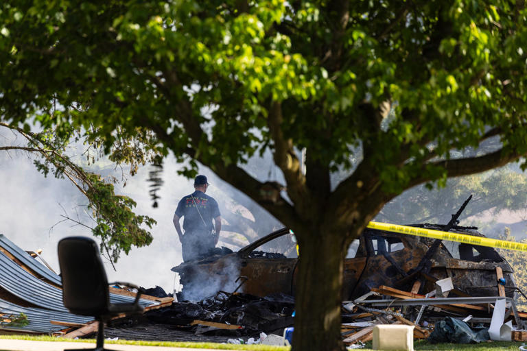 Body found after house explosion that also critically injured woman