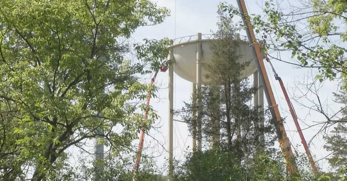Flushing smiley face water tower demolished