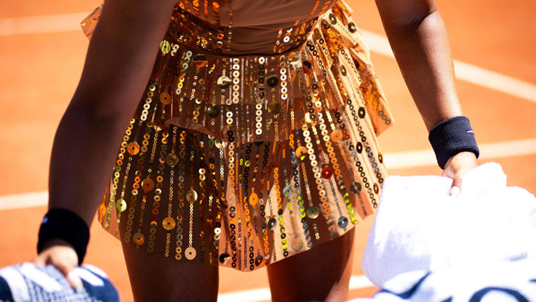 Osaka sparkles in golden French Open outfit