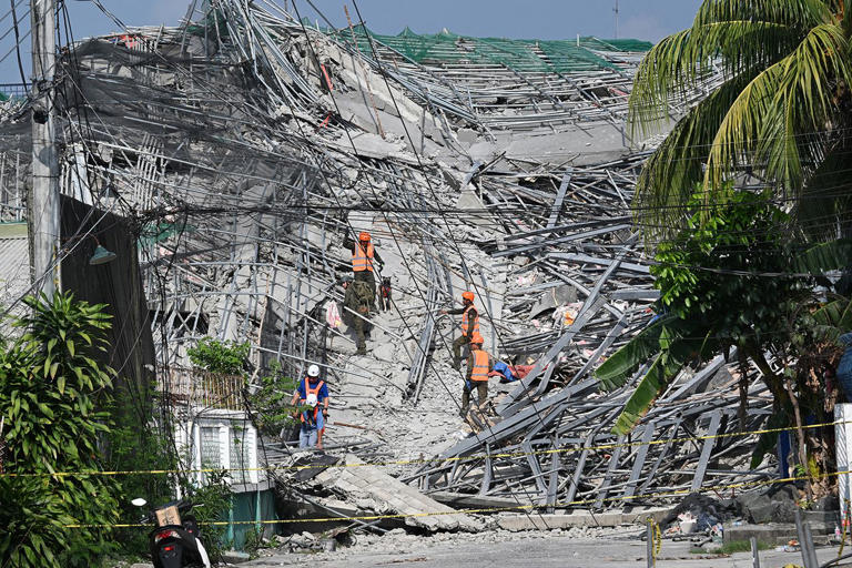 At least 4 dead and 17 missing after 9-story building collapses as ...