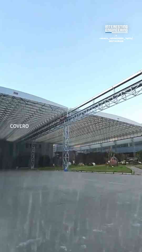Motorized retractable tent