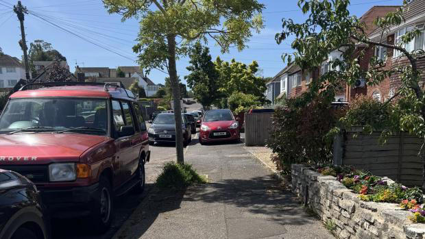 Car parked on pavement for "most of the day", resident says