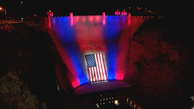 Massive flag on Hoover Dam removed to fix tear