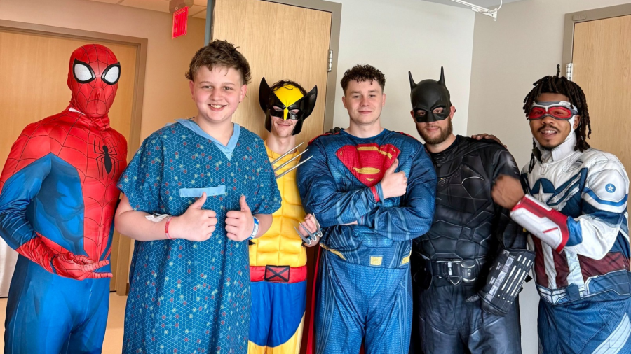 Superhero window washers surprise patients and their families at WVU ...