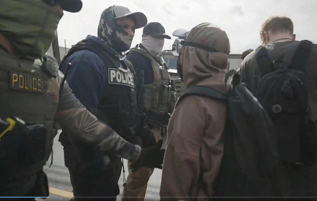 Senator pepper-sprayed as protesters storm ICE detention center