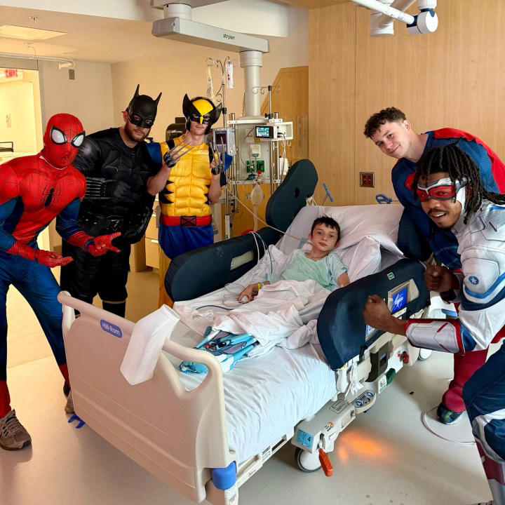 Superhero window washers surprise patients and their families at WVU ...