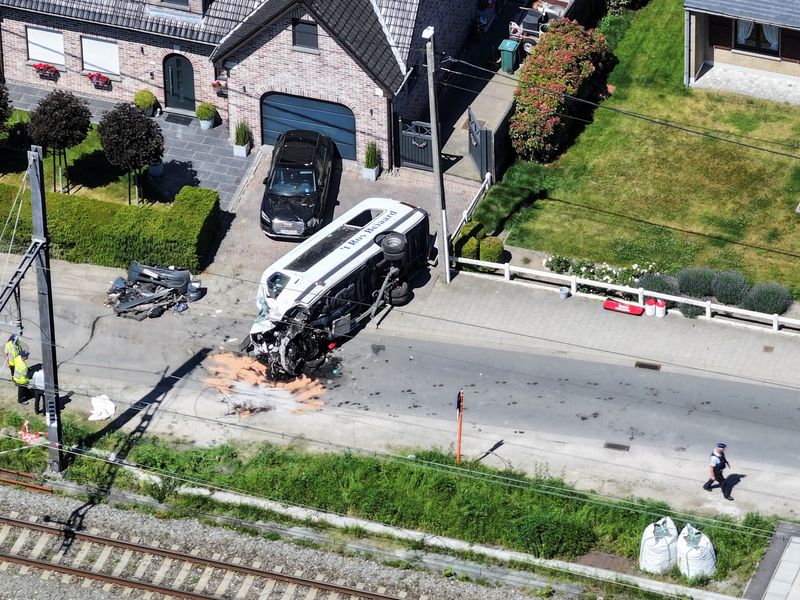 Train hits school minivan in Belgium, killing four including pupils
