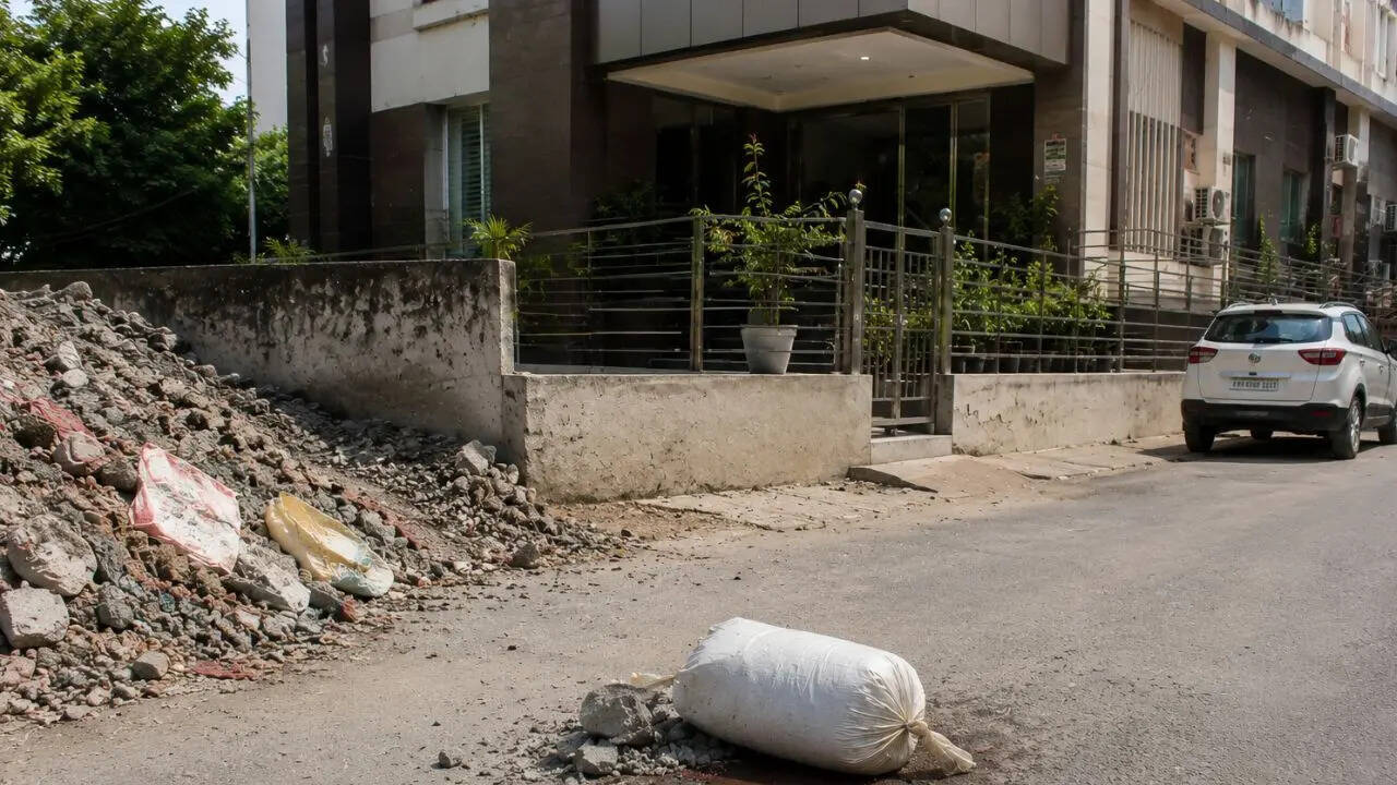 Auto showroom manager killed after debris sack thrown from hotel hits ...