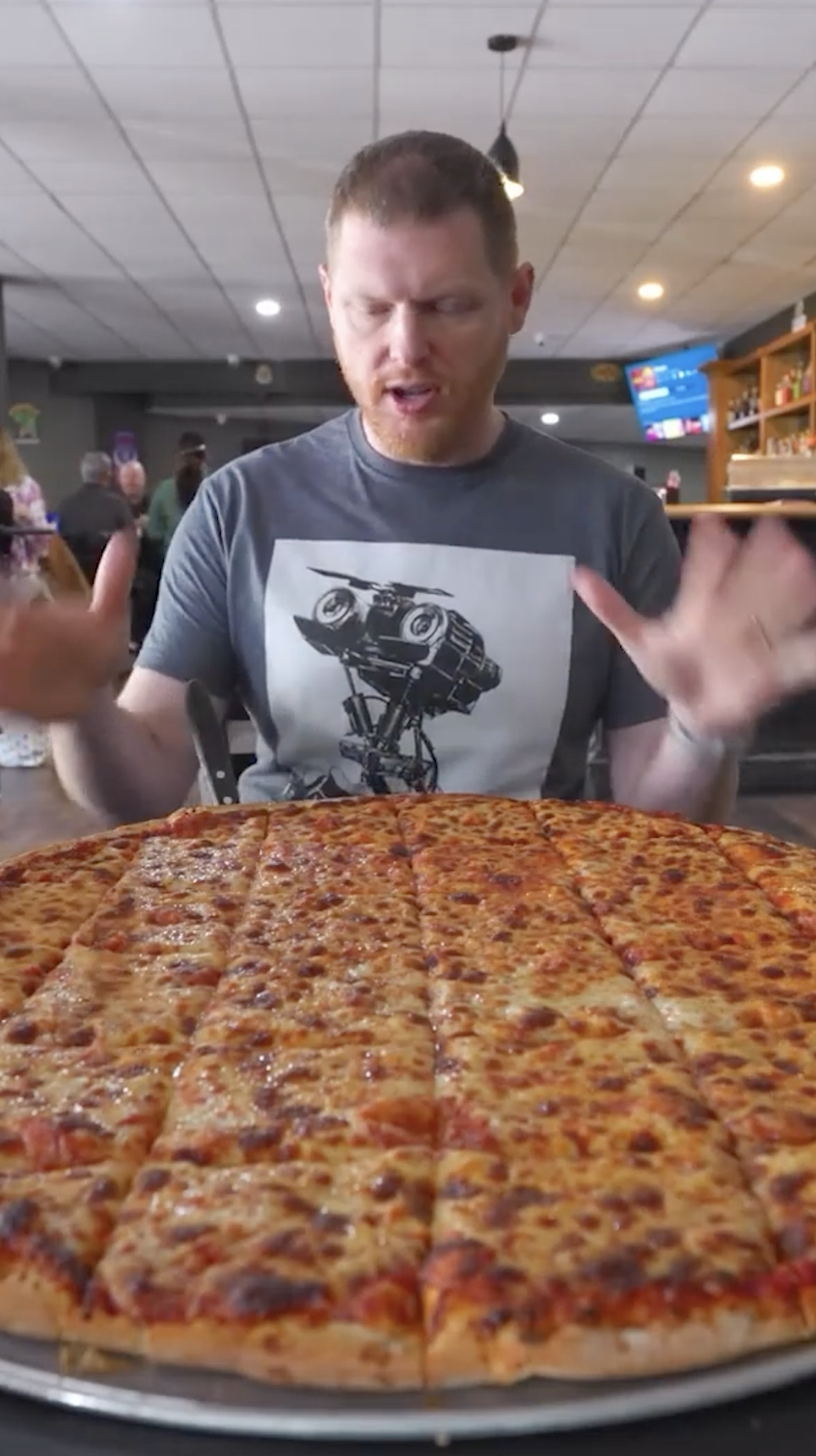 $410 if I finish this giant pizza in 1 hour