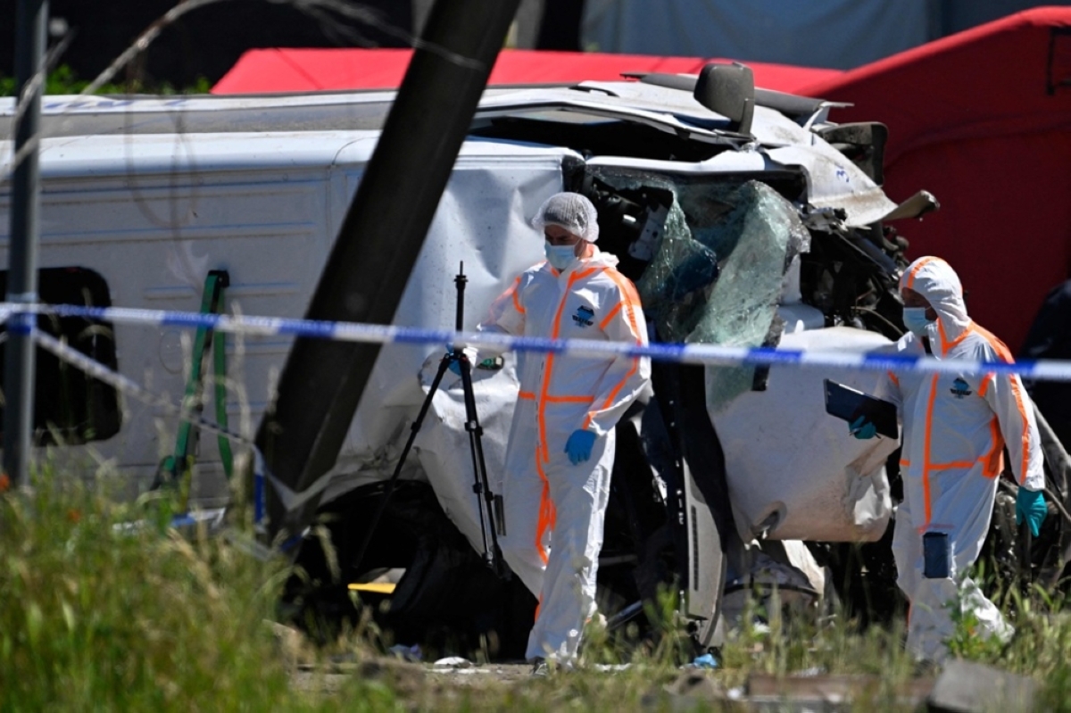 Four dead after train hits school bus in Belgium