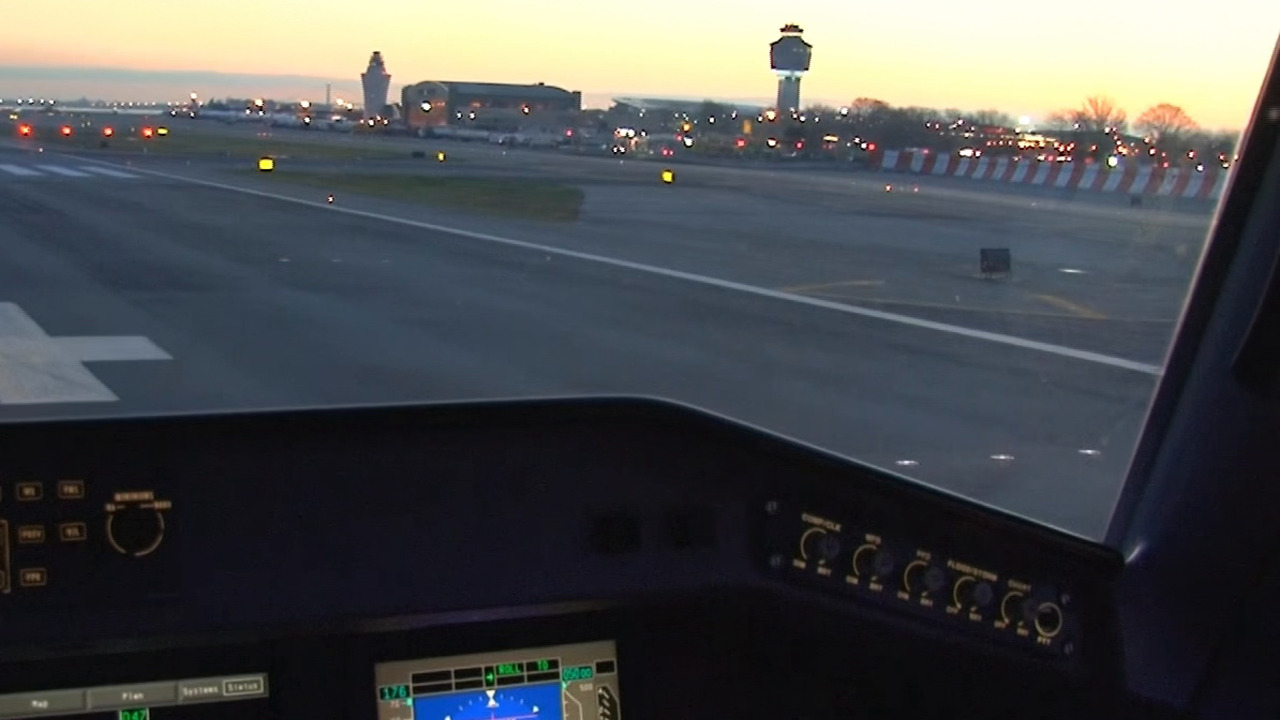 Embraer 175 arrives at La Guardia Airport in New York