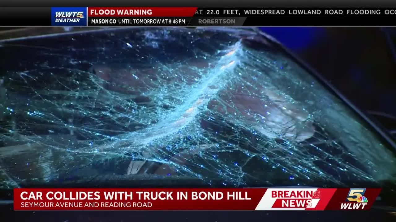 Car overturns after truck collision in Bond Hill