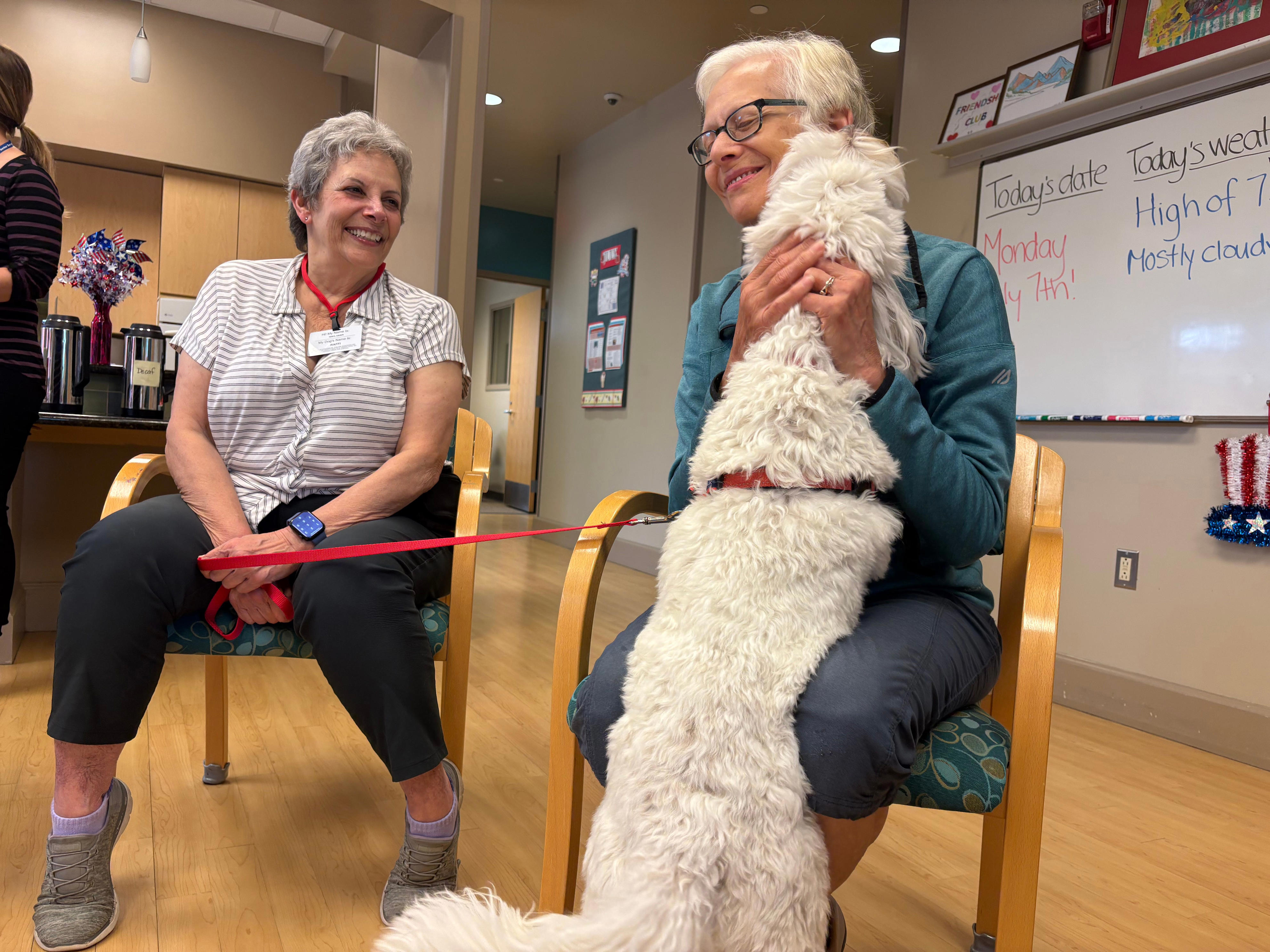 Pet visits, music enliven seniors' day while caregivers get a break