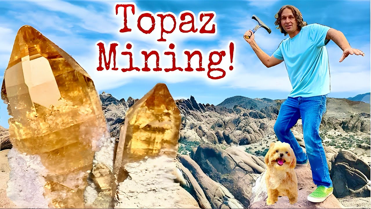 Breaking out topaz crystals from huge boulder!