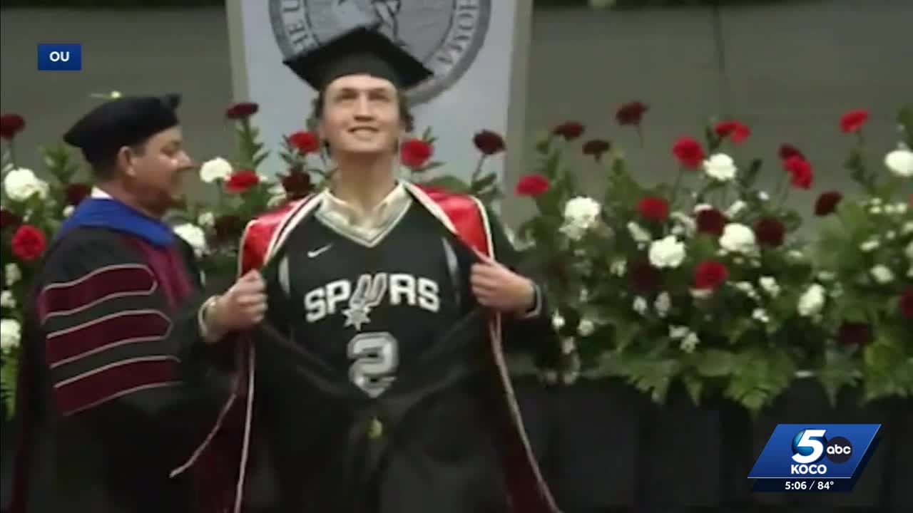 'All friendly banter': OU graduate flashes Spurs jersey under ...