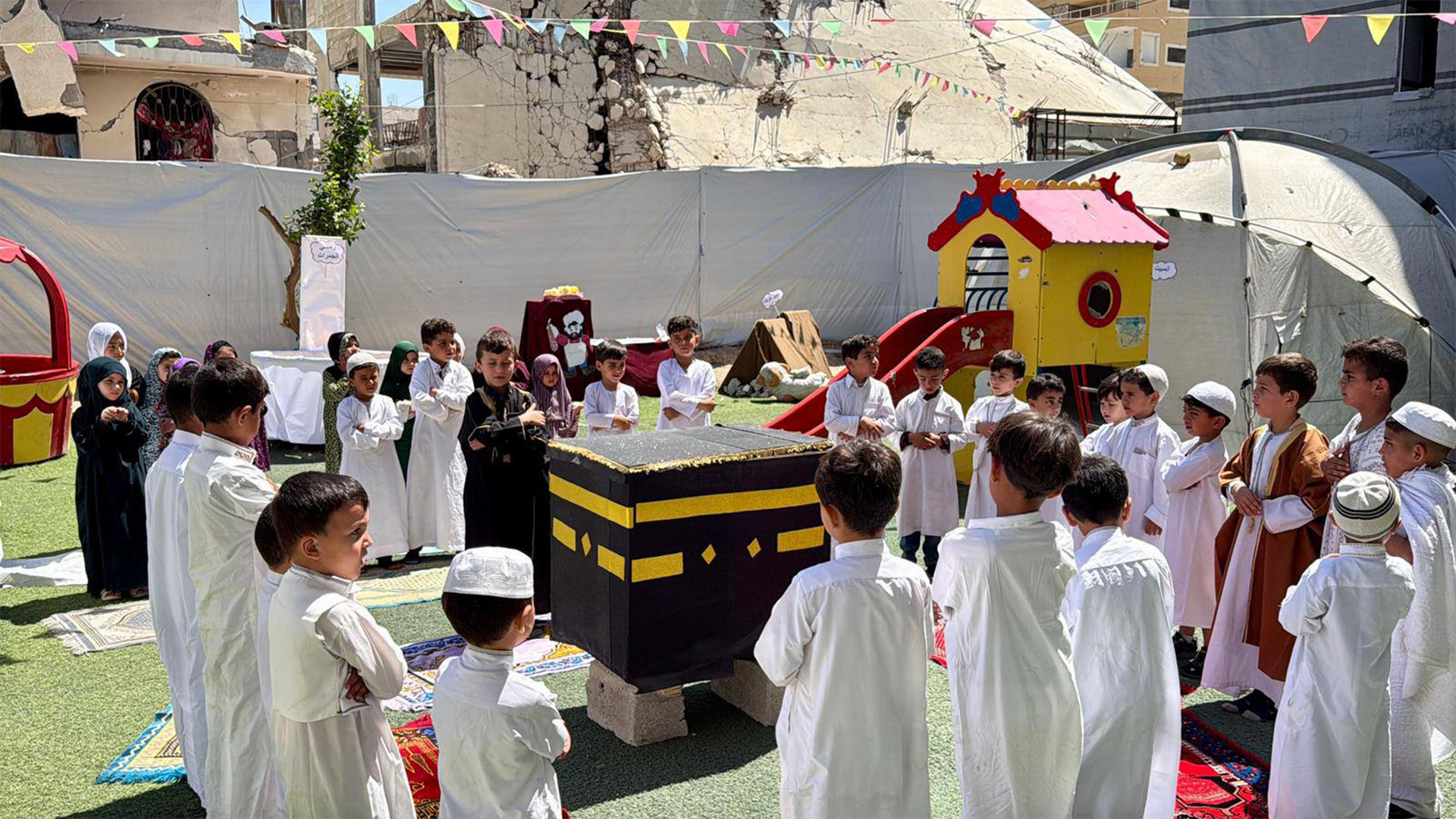 Children perform 'mini Hajj' in Gaza as Israel blocks pilgrims