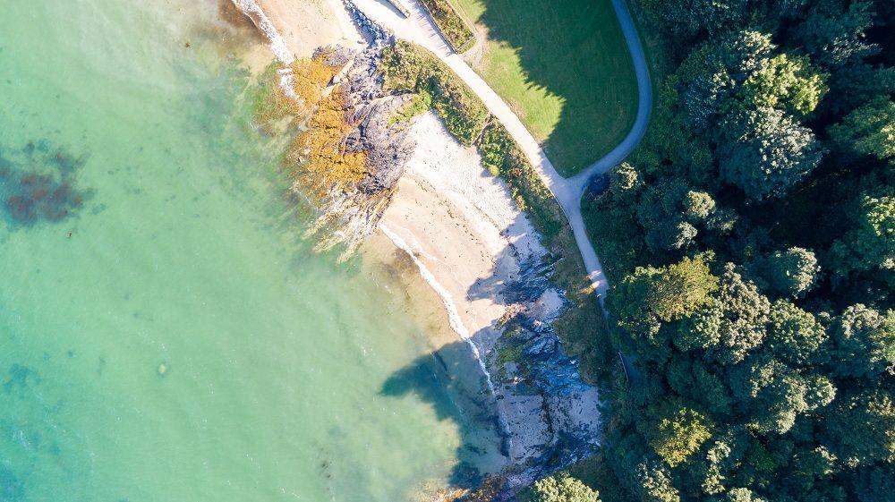 Beachgoers seriously injured in suspected racially motivated assault