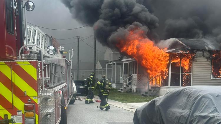 Fire crews extinguish house fire on Osceola Avenue in Suffolk