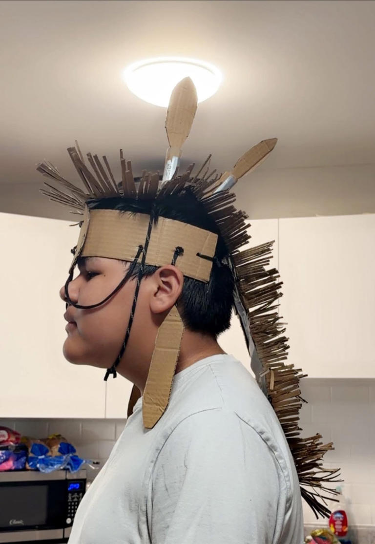 Moosomin First Nation boy crafts his own powwow regalia out of cardboard