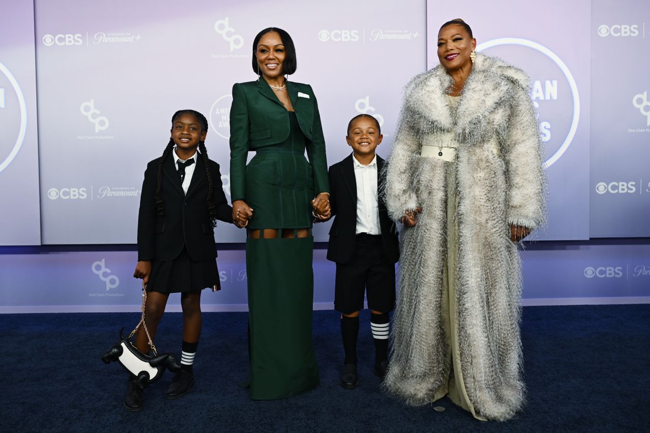 Queen Latifah enjoys rare family outing at the AMAs with her partner ...