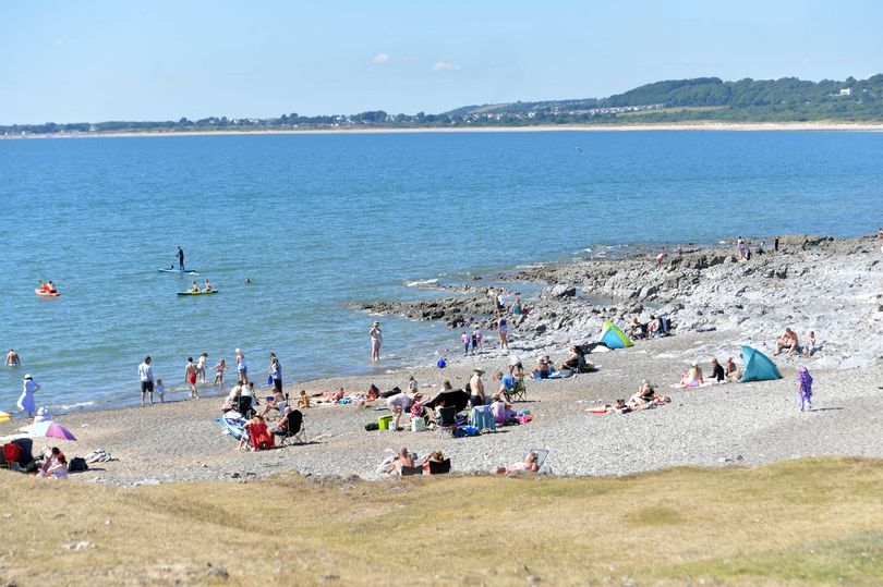 Police tow cars at popular Welsh beach as people dump vehicles at the ...