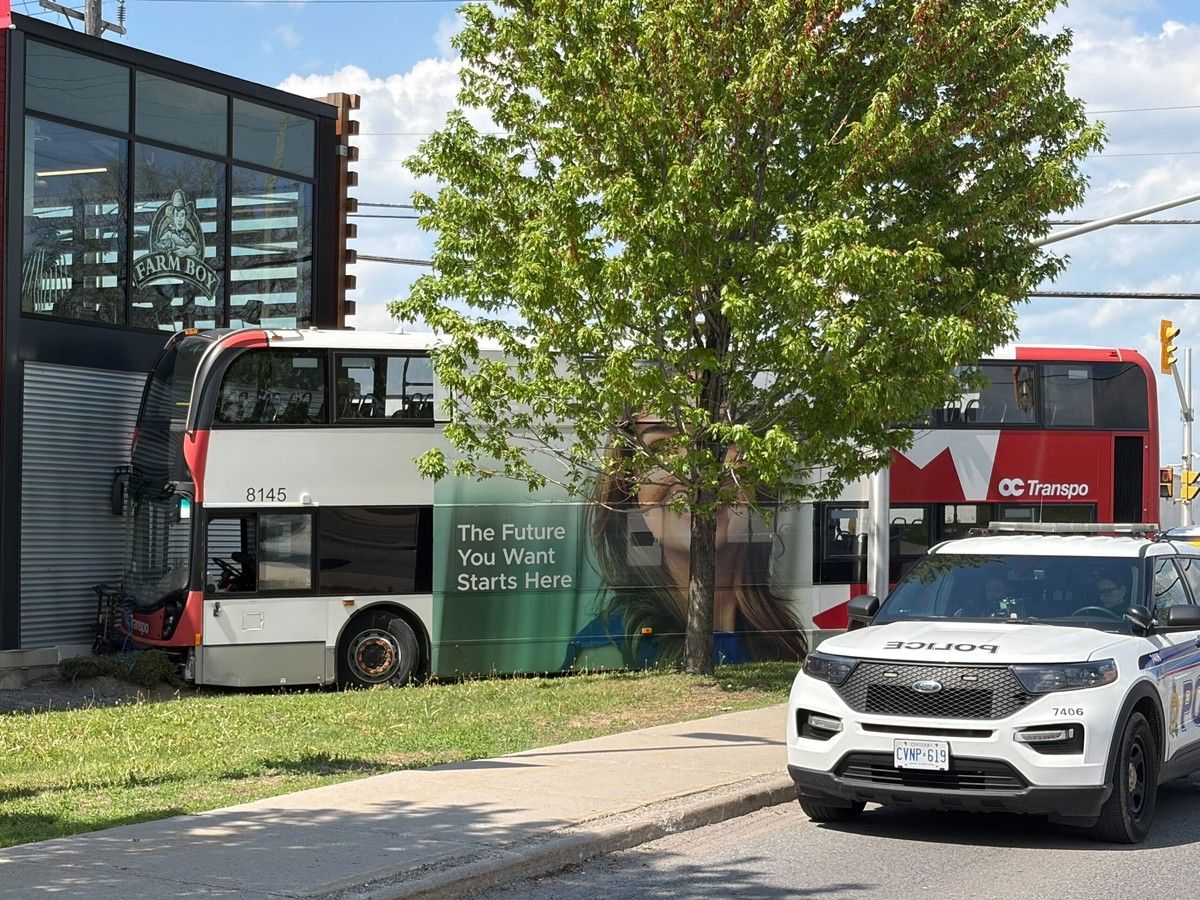 OC Transpo double-decker bus comes loose of tow truck, hits Trainyards ...