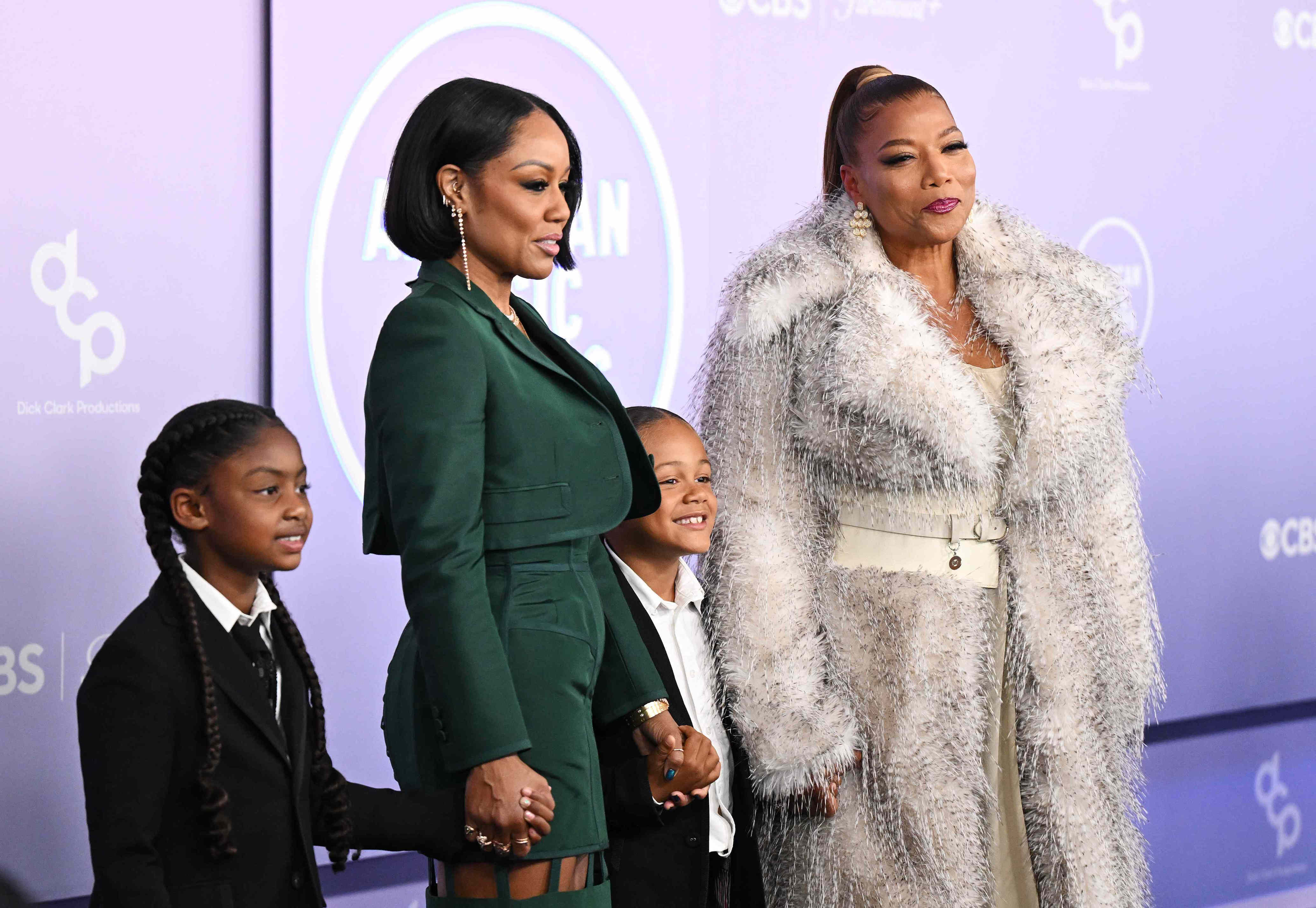 Queen Latifah enjoys rare family outing at the AMAs with her partner ...