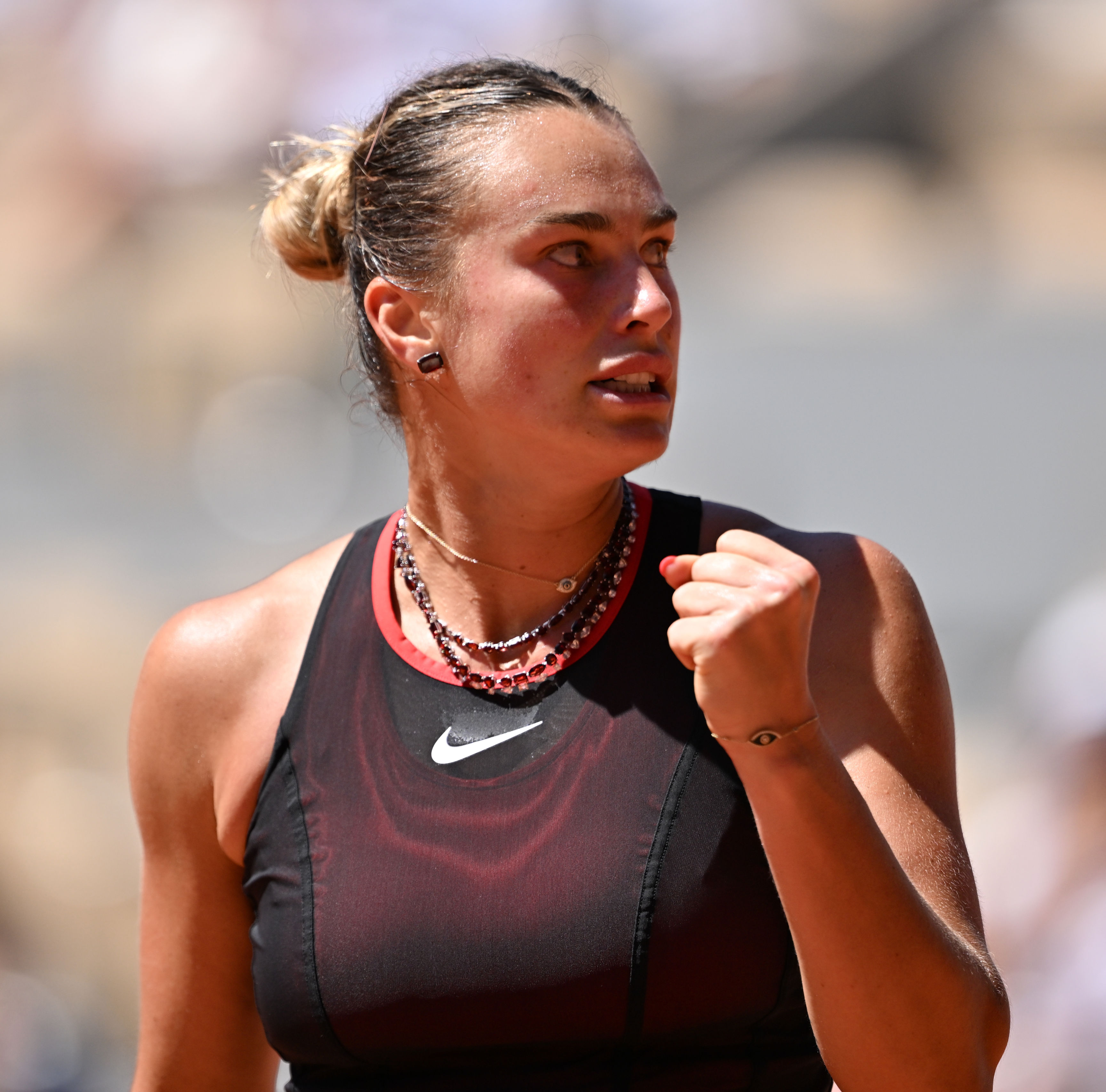 Aryna Sabalenka wins French Open match wearing more than 125 carats of ...