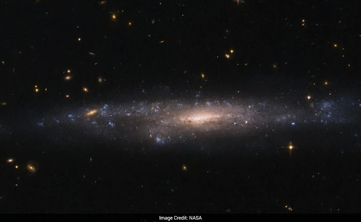 NASA's Hubble telescope spots mysterious dim galaxy hidden in space